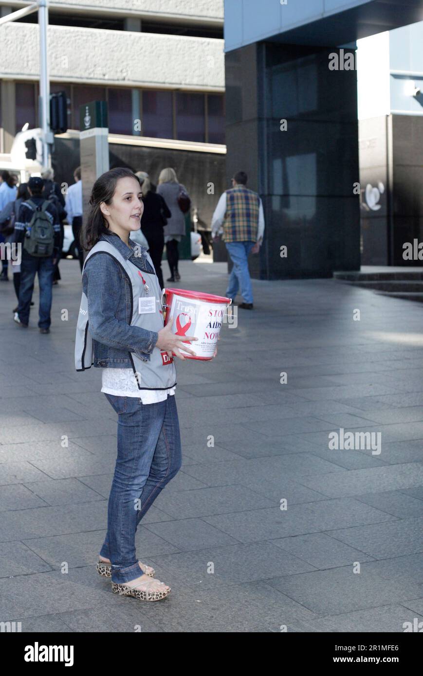A collector seeks public donations for the Aids Trust of Australia on ...