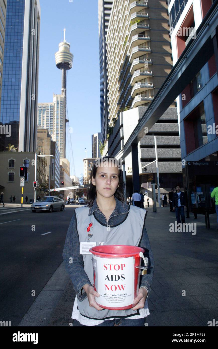 A collector seeks public donations for the Aids Trust of Australia on ...