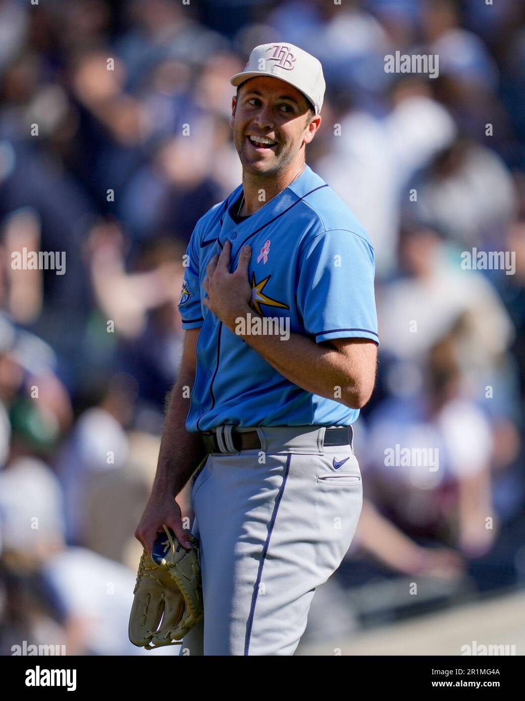 Tampa Bay Rays relief pitcher Jason Adam (47) reacts after center ...
