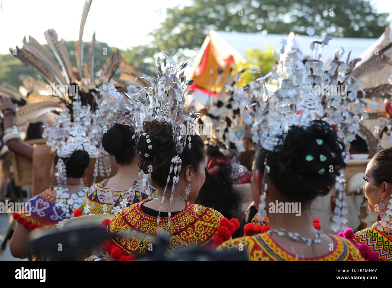 Iban maidens with their traditional headdress in Kuching, Sarawak ...