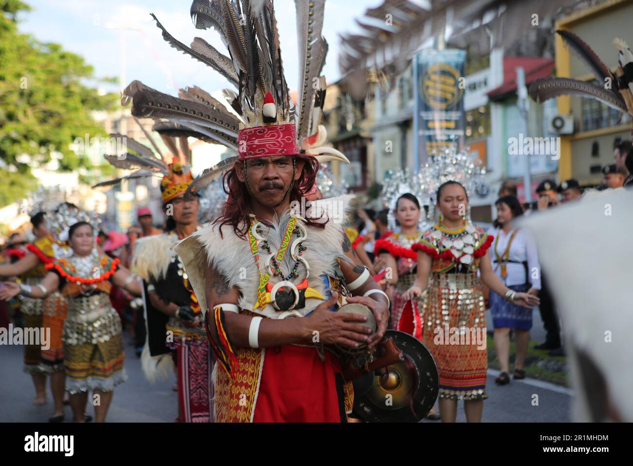 Dayak Chief in full regalia at a Traditional Costume Parade in Kuching ...