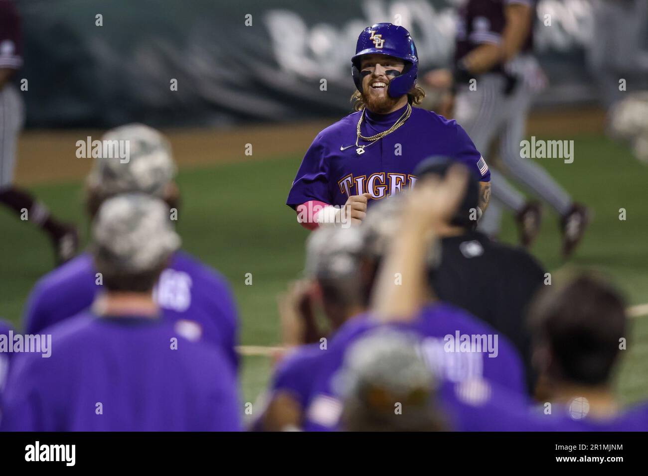 May 12, 2023: LSU's Tommy White (47) smiles as he jogs to home plate ...