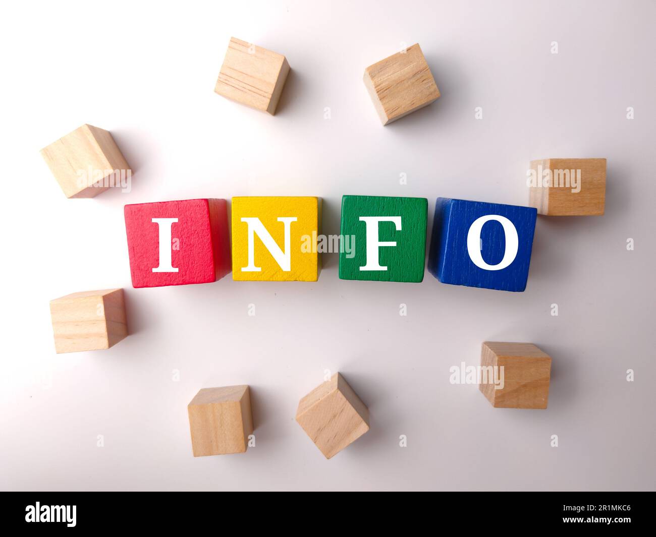 Colored wooden cube with the word INFO on white background Stock Photo ...