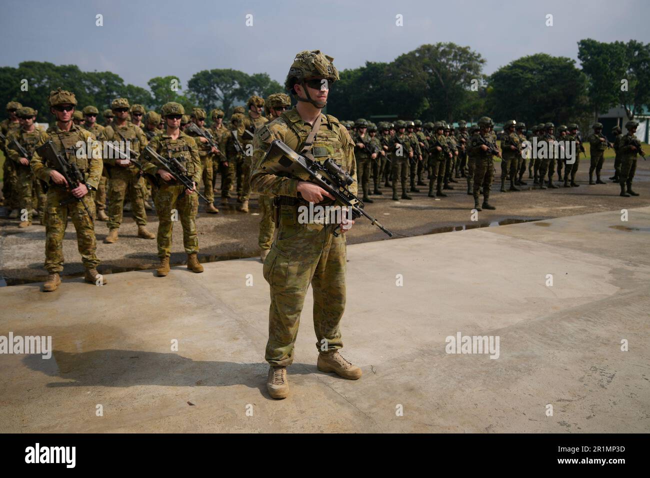 Australian and Philippine troops wait for the start of opening ...