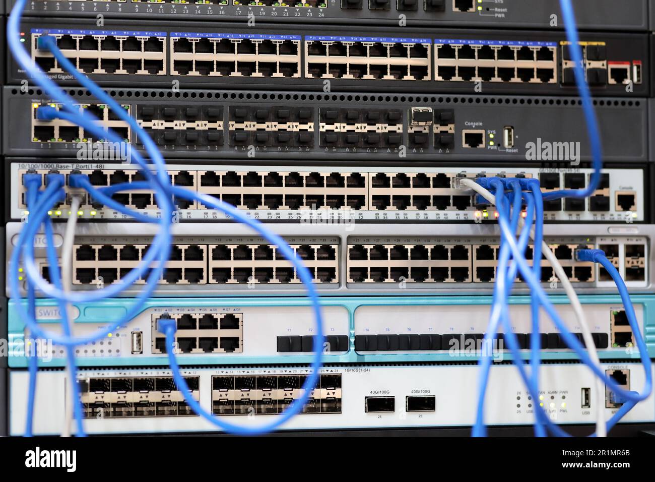 Racks with network equipment and patch cord cables. Selective focus Stock Photo - Alamy