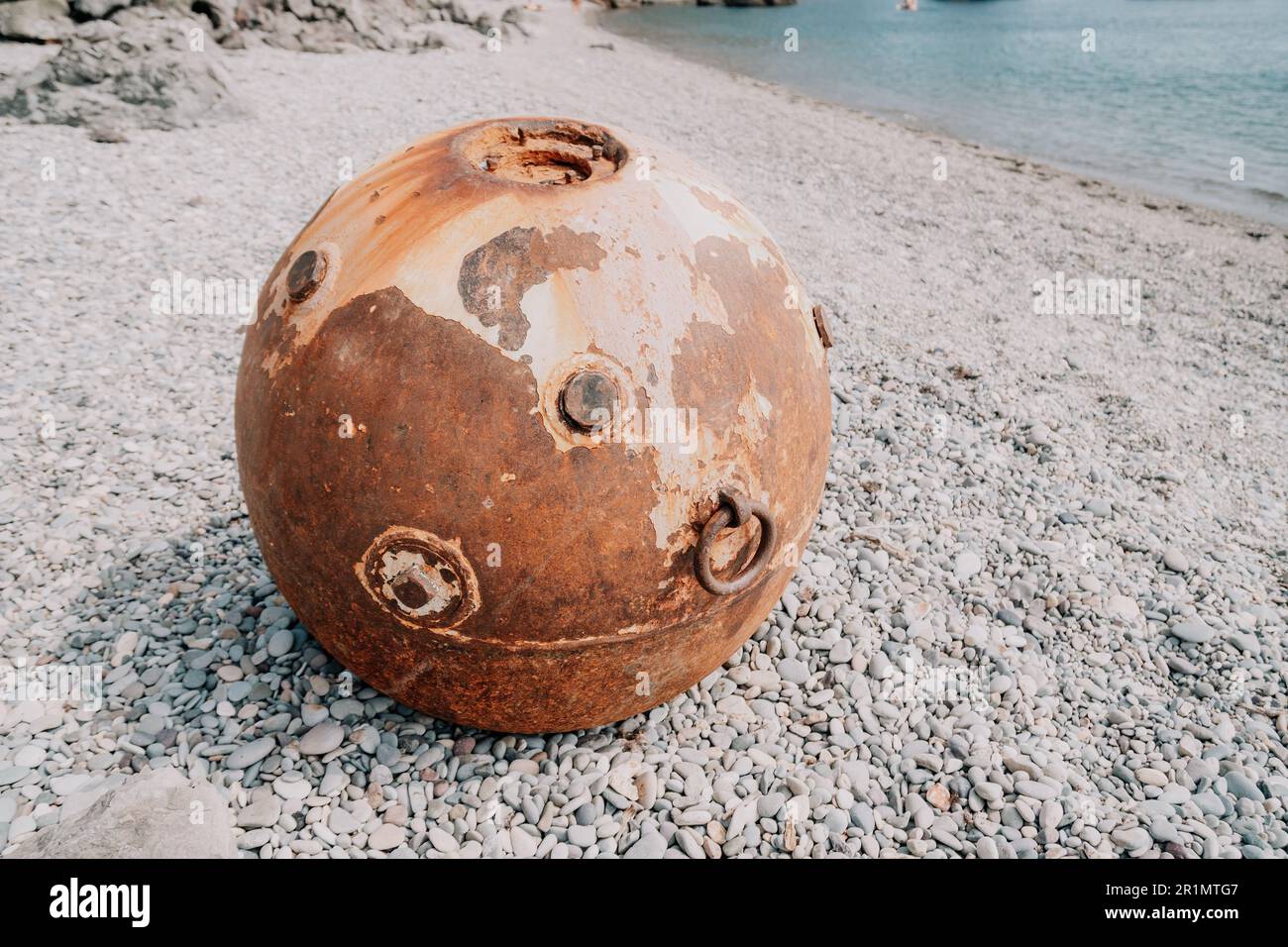 Old rusty sea mine on the beach Stock Photo - Alamy