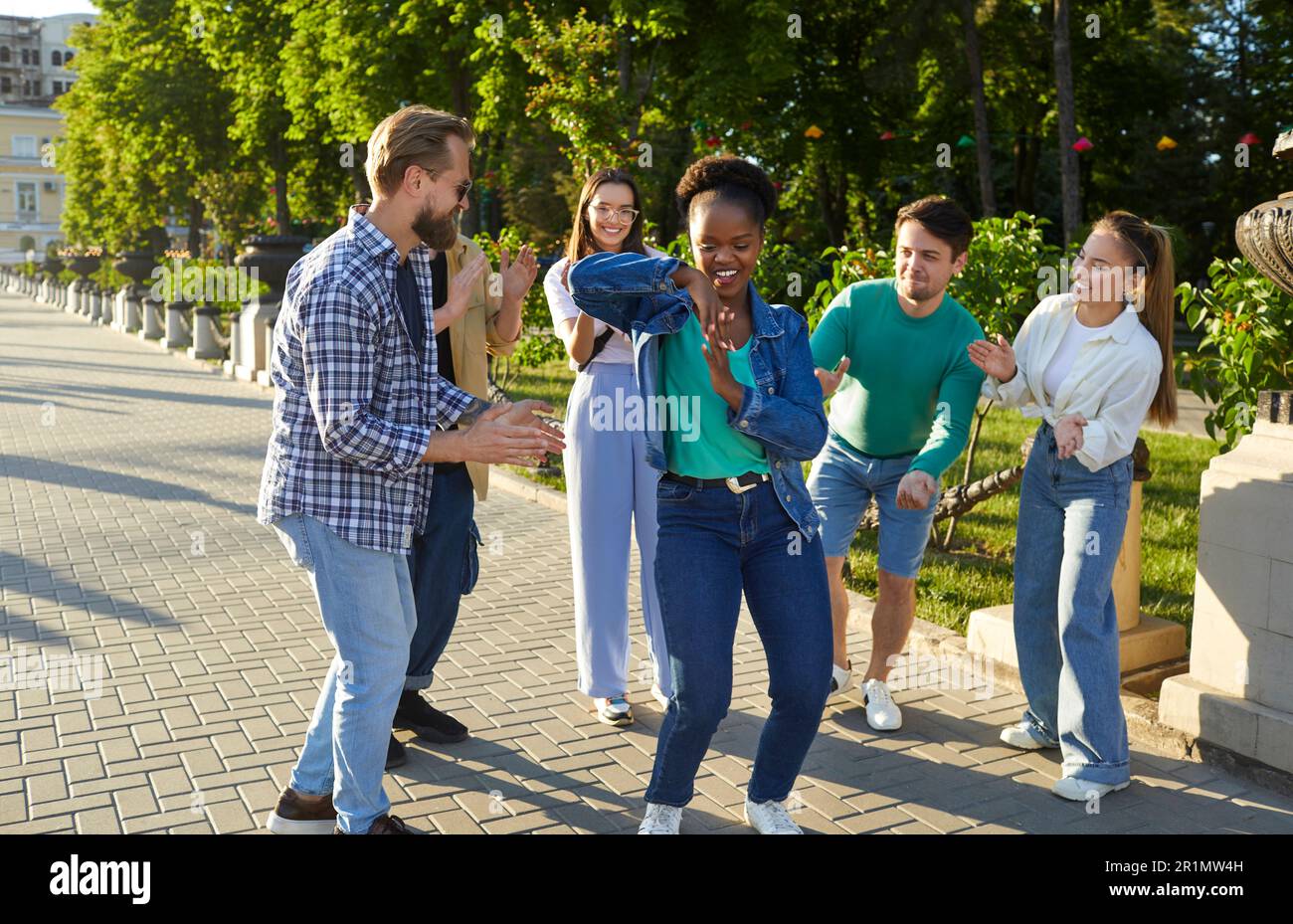 Young friendly multiracial people free from ethnic prejudice spend time ...