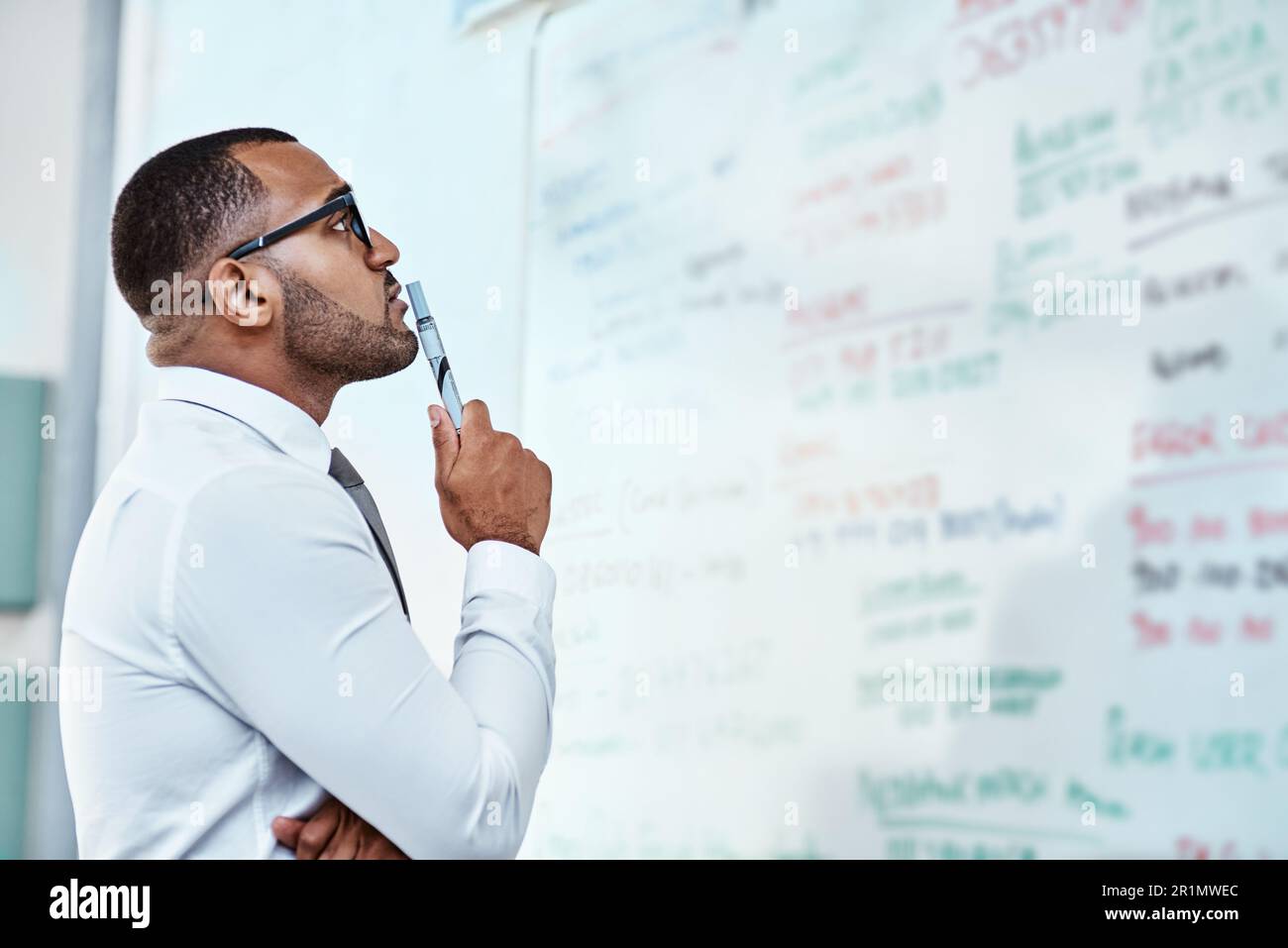Thinking, planning and business man on whiteboard brainstorming, ideas ...