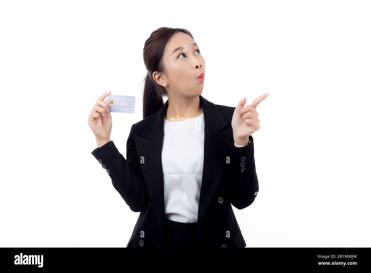 Portrait young asian business woman holding credit card or debit card ...