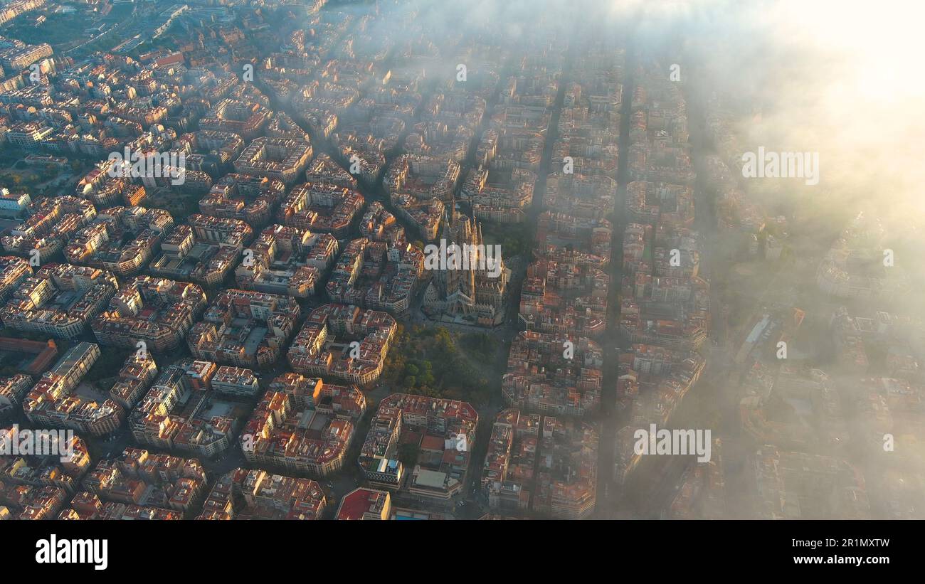 Barcelona City above the clouds and fog, Sagrada Familia Cathedral ...