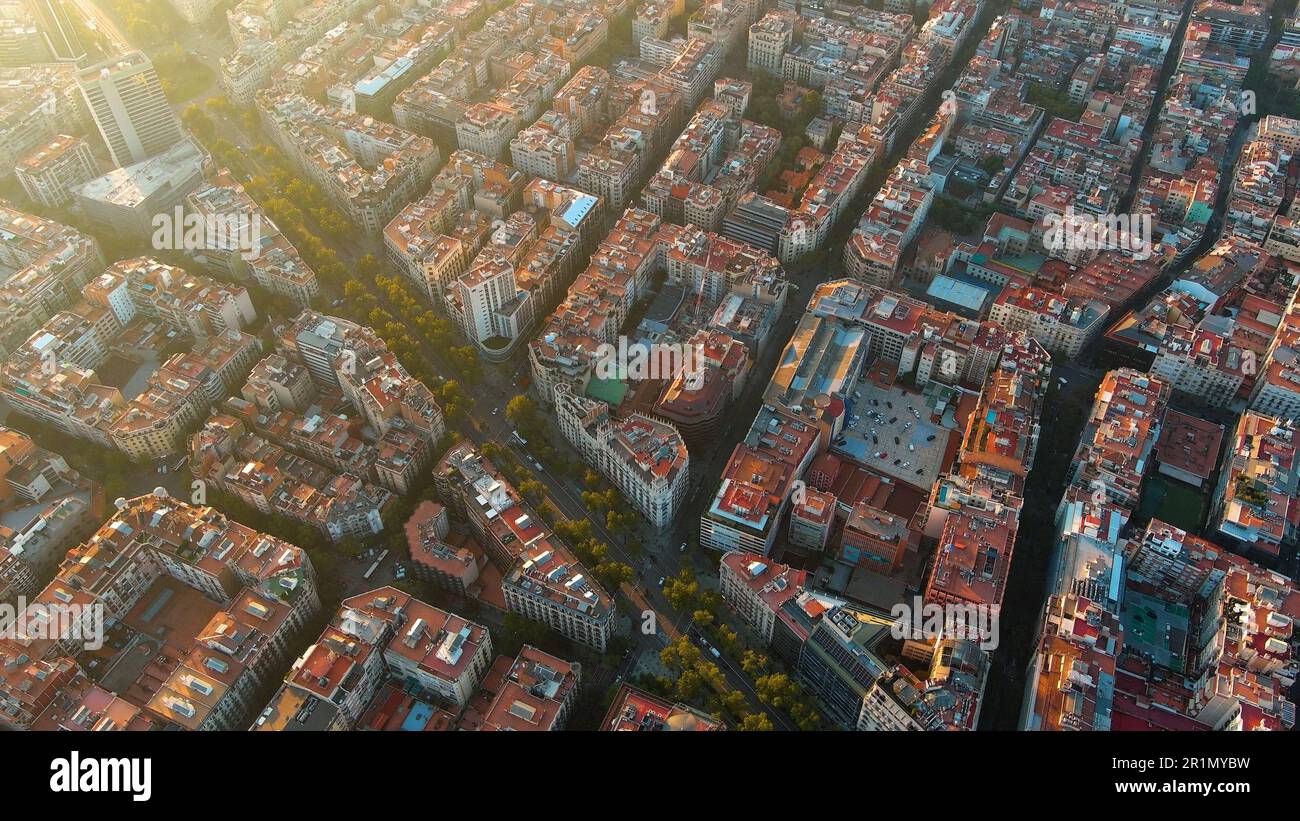 Barcelona city skyline, aerial view. Eixample residential district at sunset. Catalonia, Spain ...