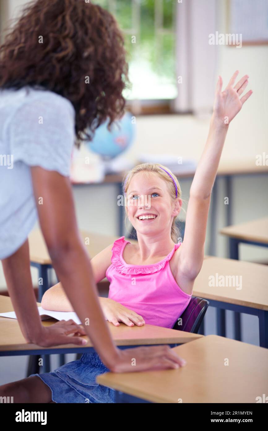 Child class hand up talking hi-res stock photography and images - Alamy