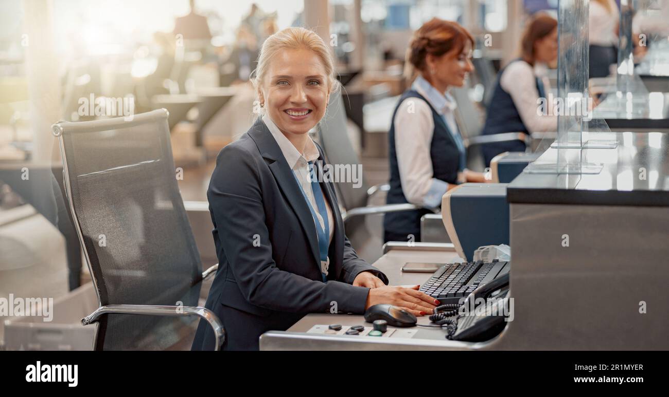 Passport control workers sitting at their workplace Stock Photo - Alamy