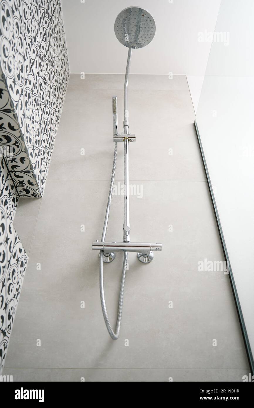 Modern shower set in bathroom interior. Hygiene concept Stock Photo - Alamy