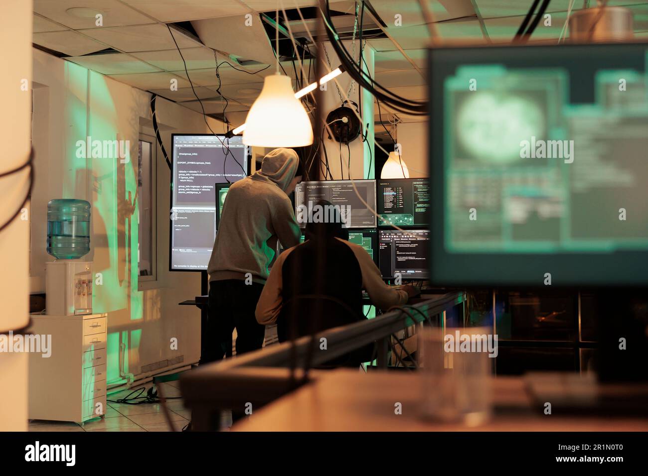 Team of diverse spies using trojan virus to access network Stock Photo ...
