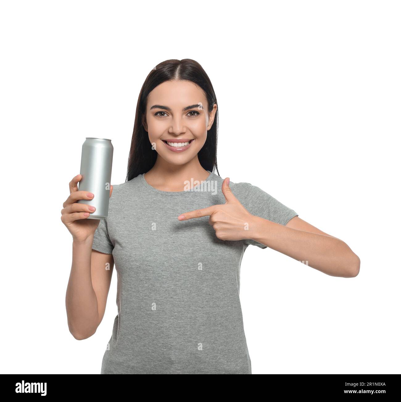 Beautiful happy woman holding beverage can on white background Stock ...