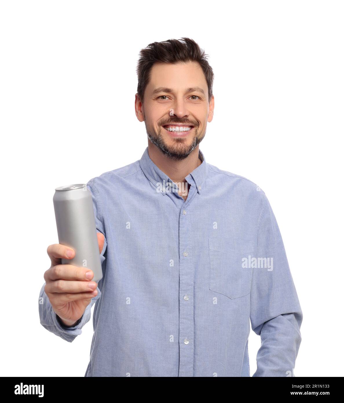 Happy man holding tin can with beverage on white background Stock Photo ...