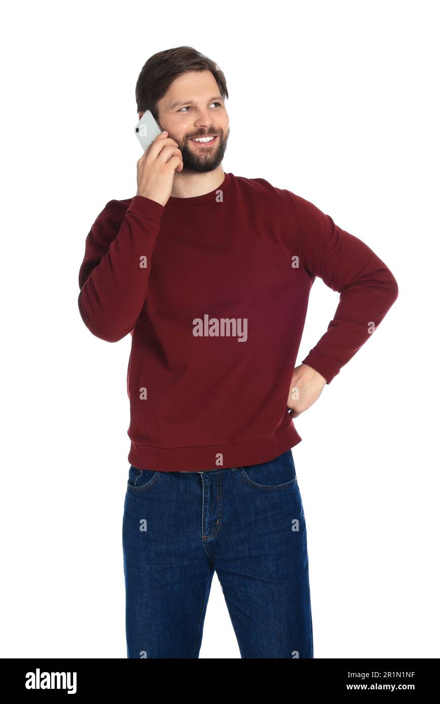 Man talking on smartphone against white background Stock Photo - Alamy