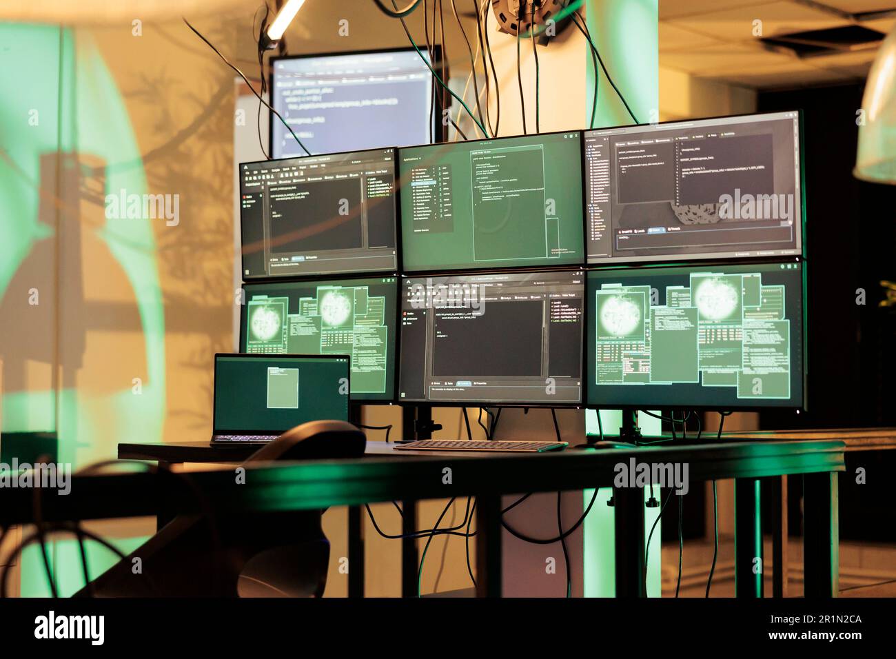 Dangerous software script running on multiple monitors Stock Photo - Alamy