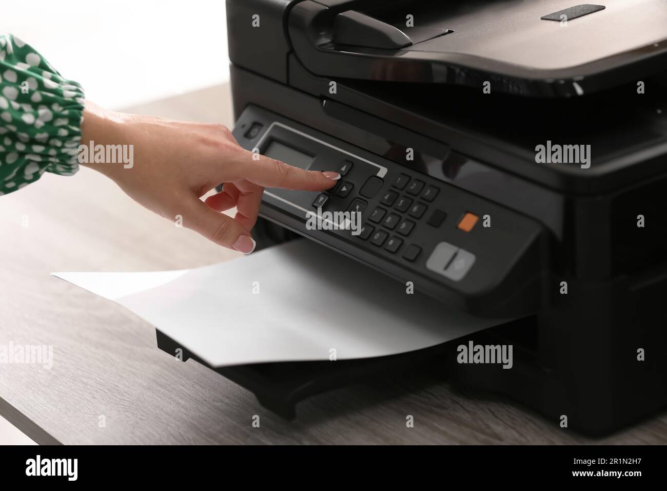 Person using multifunction printer hi-res stock photography and images ...