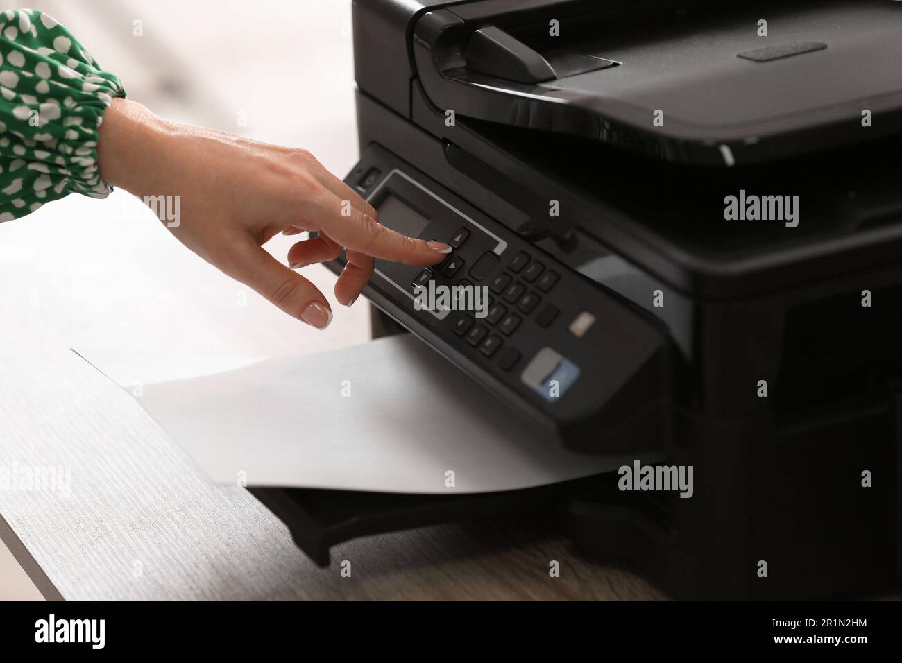 Person using multifunction printer hi-res stock photography and images ...