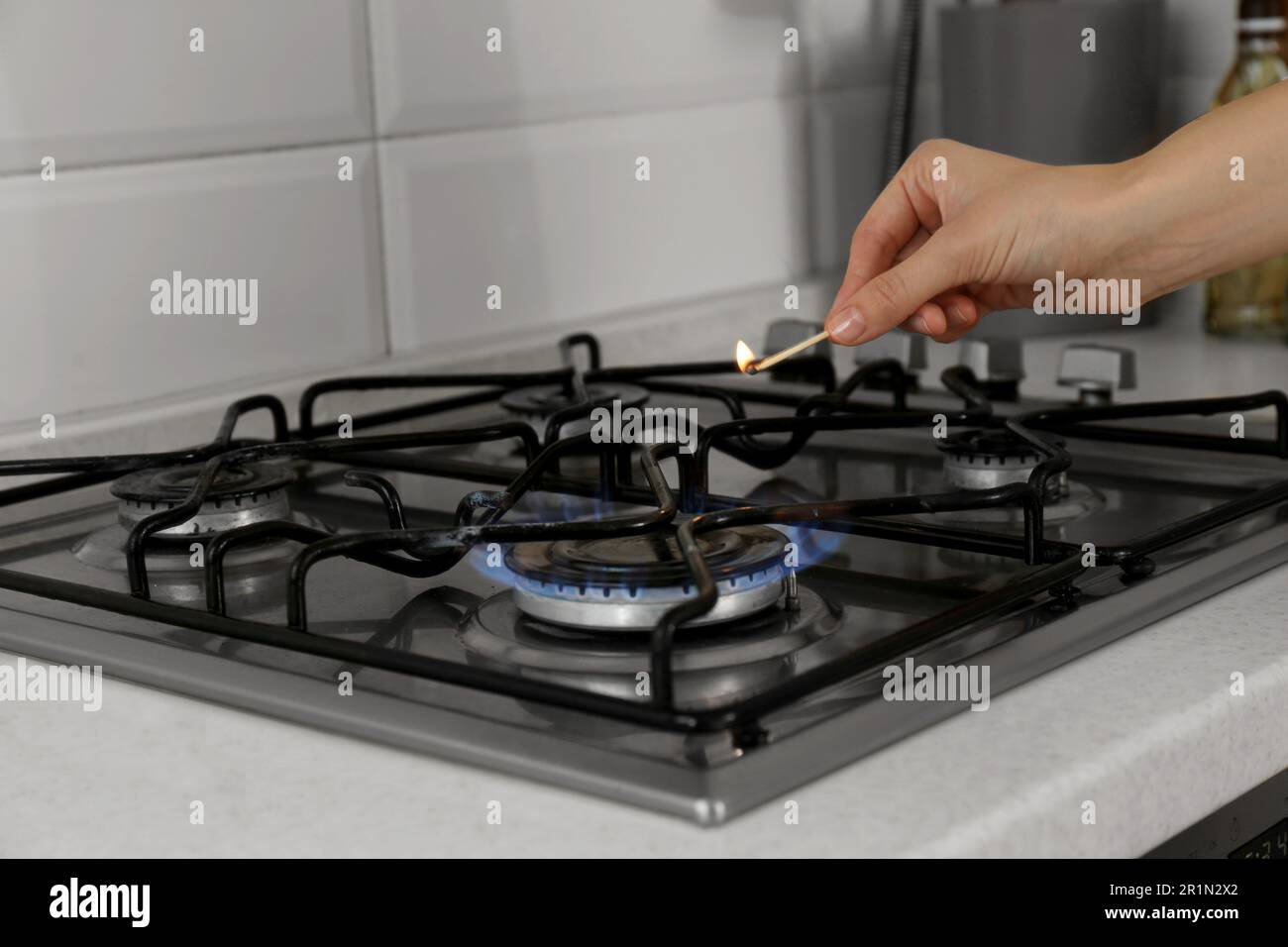 Adult burn hand hot stove hi-res stock photography and images - Alamy