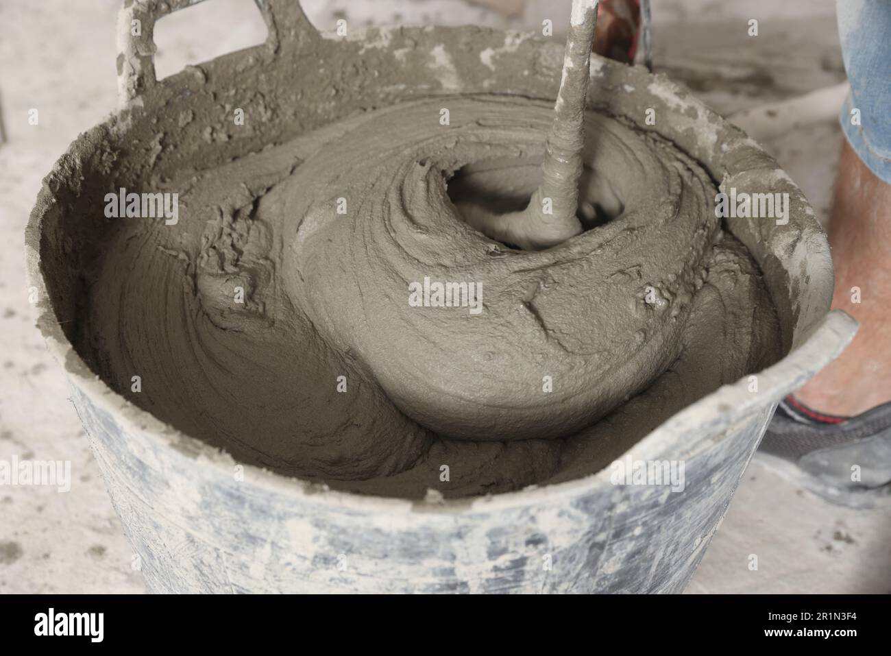 Male construction worker putting cement hi-res stock photography and ...