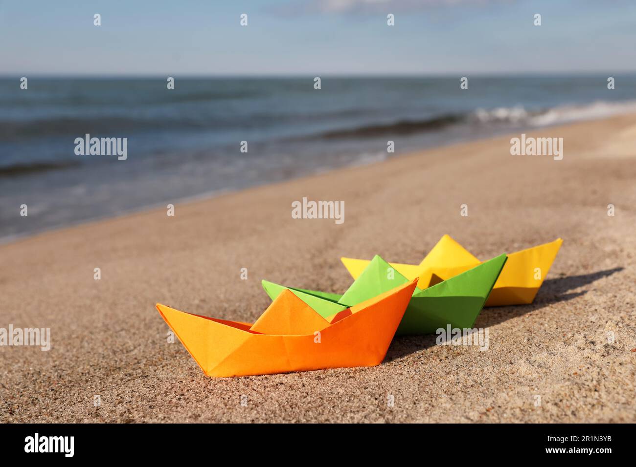Light green paper boats hi-res stock photography and images - Alamy