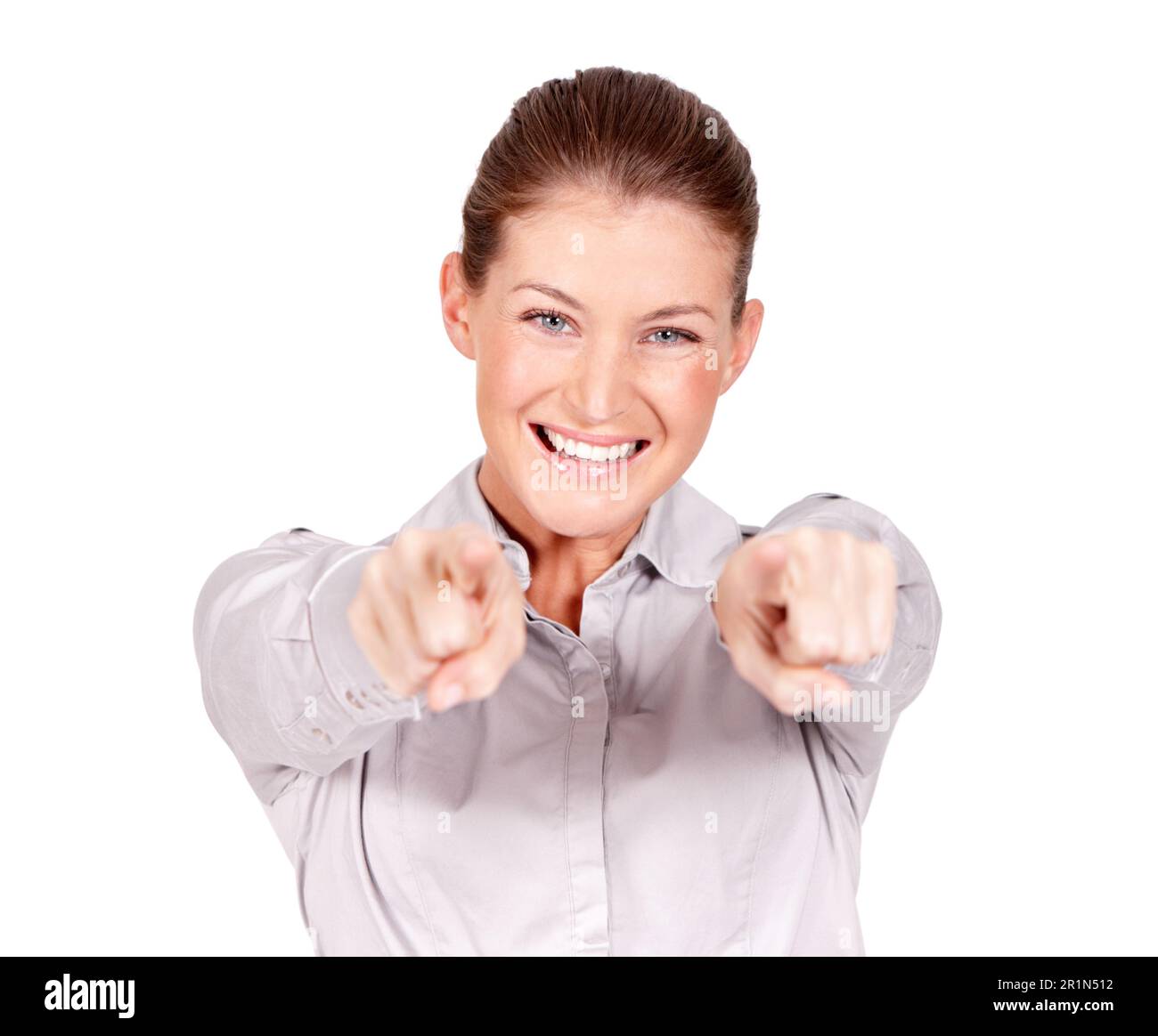 Portrait, happy woman and pointing finger to you in white background ...