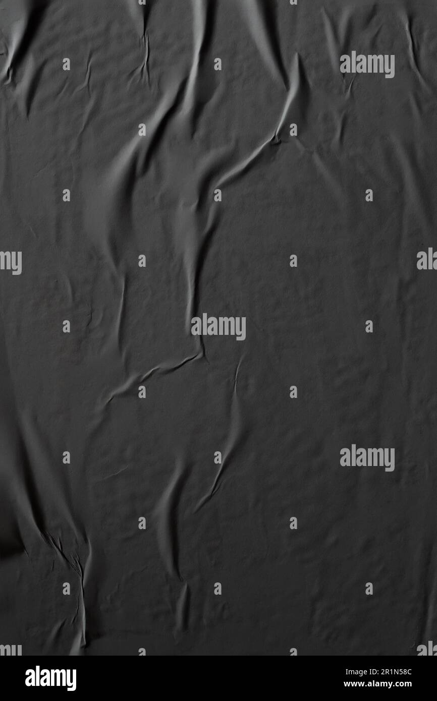 Vertical black wheat paste poster texture background Stock Photo - Alamy