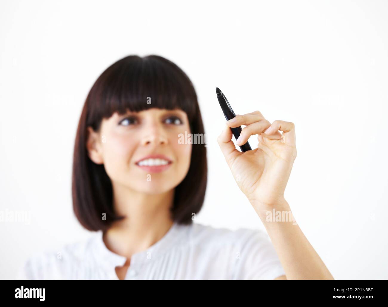 Business woman, writing and smile for schedule, planning or strategy ...