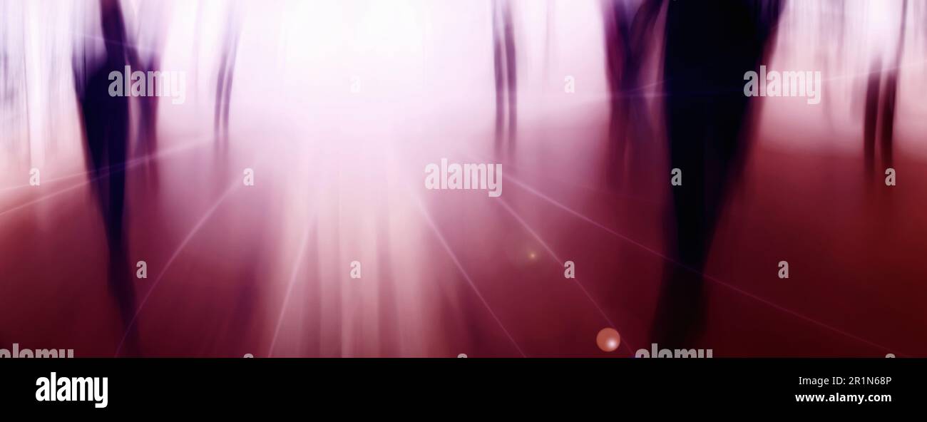 Blurred people walking in a fast motion in the street. Dizzy abstract ...