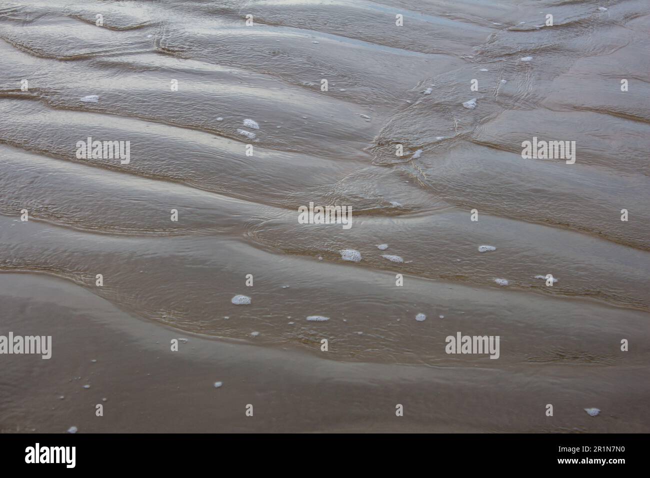 wave pattern in sand at beach in Pantai Beringgis, Sabah, Malaysia ...