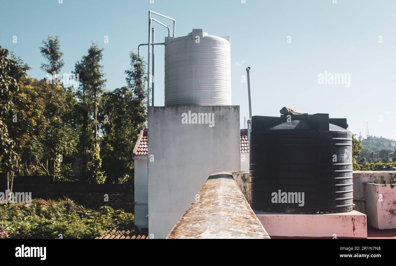 Overhead water tanks on the roofs for storing the water needs for the ...