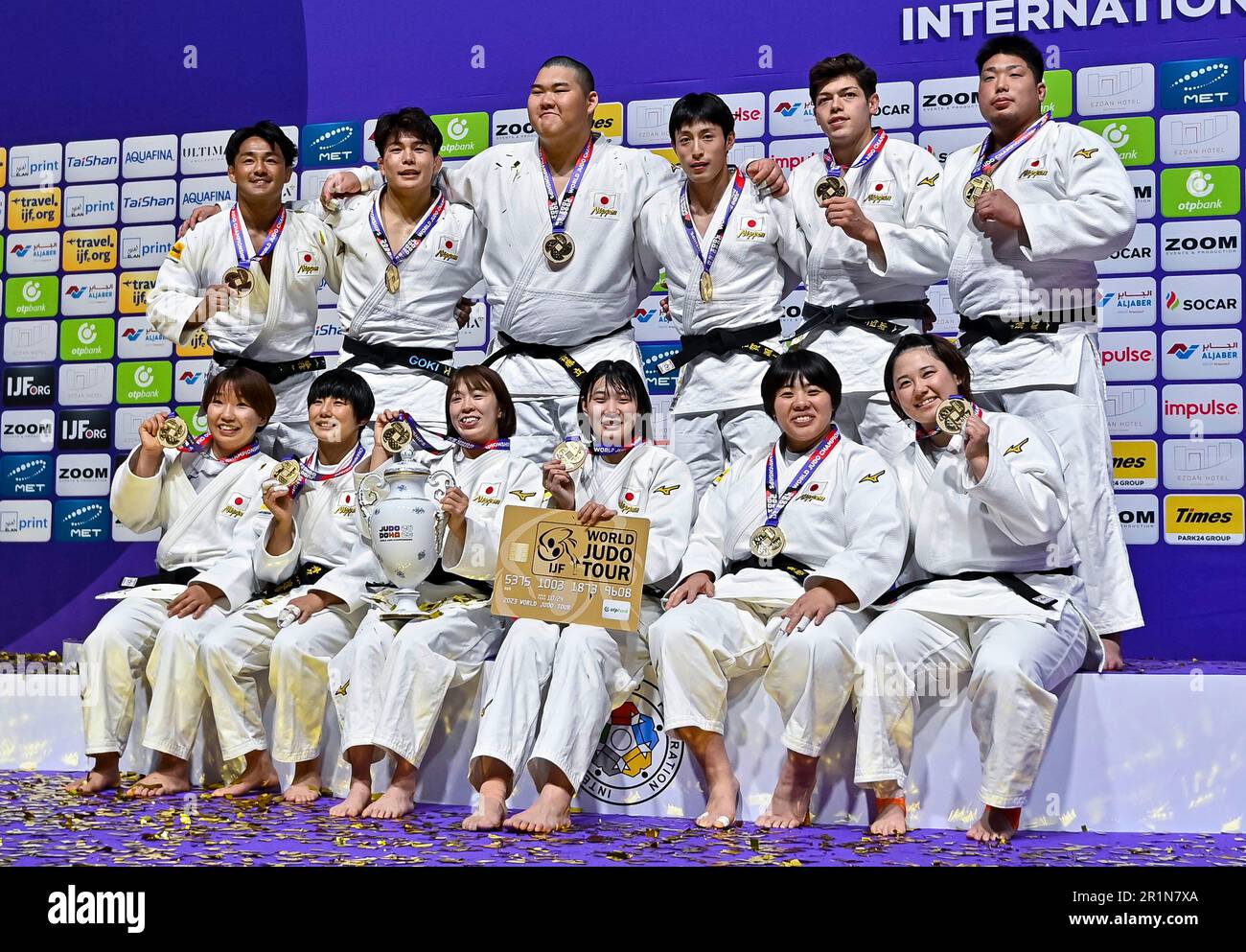 Doha. 14th May, 2023. Gold medalists team Japan pose on the podium ...