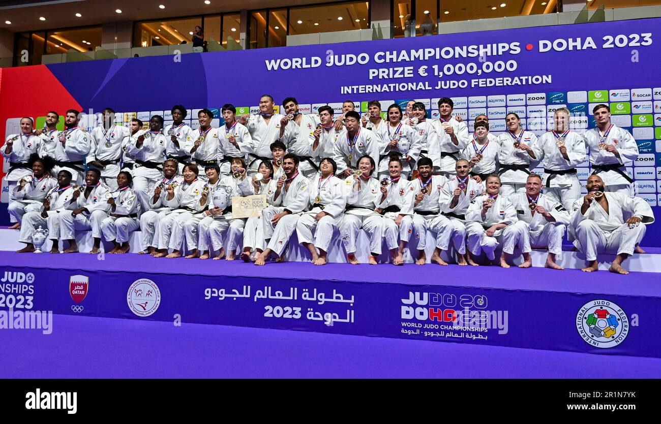 Doha, France (L) and bronze medalists team Georgia and team Netherlands (R) pose on the podium ...