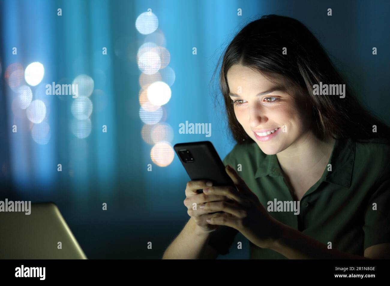 Woman looking screen laptop night hi-res stock photography and images ...