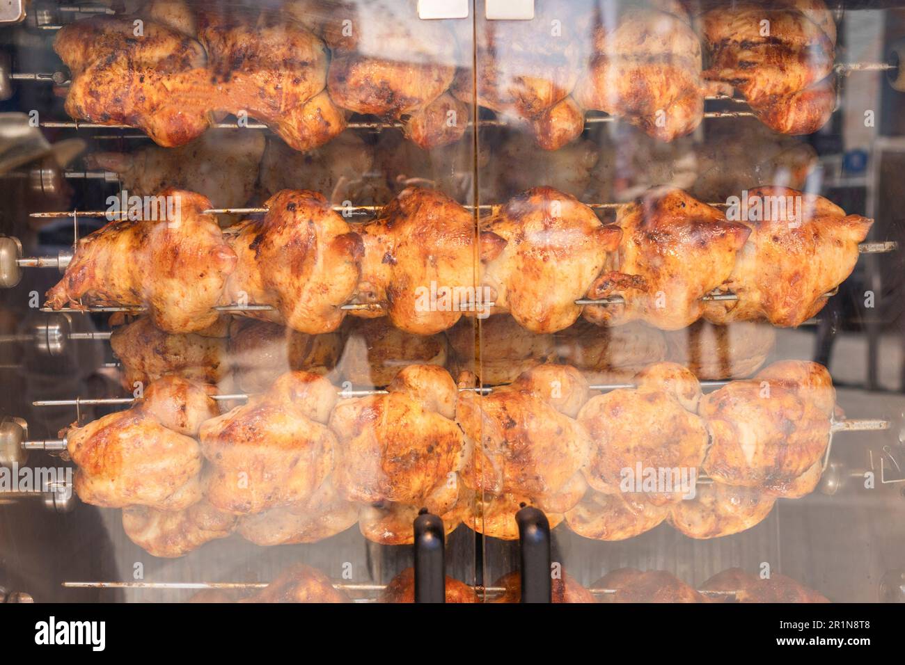 Golden rotisserie chicken in restaurant hi-res stock photography and ...