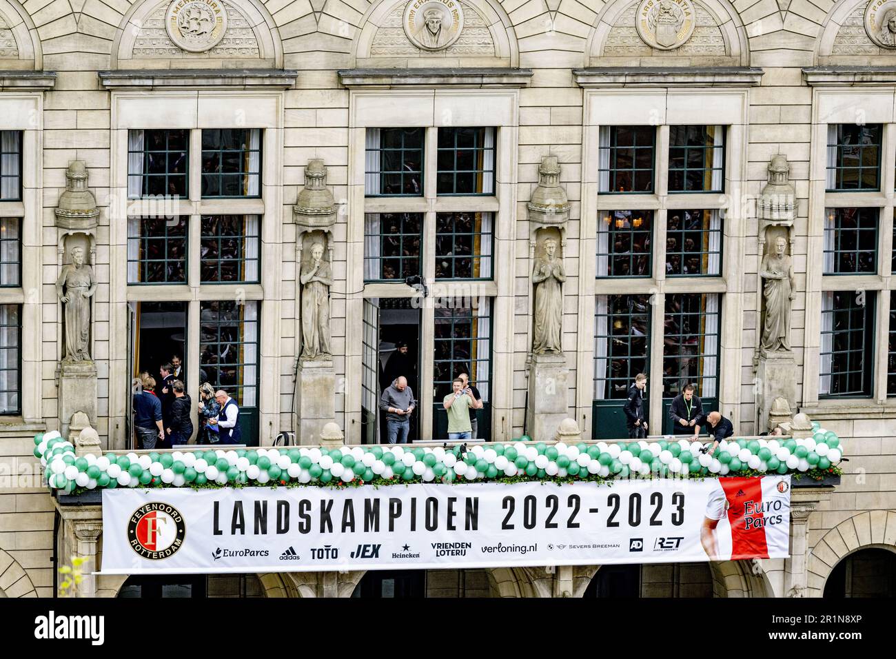 ROTTERDAM - Football fans are already standing in front of the balcony ...