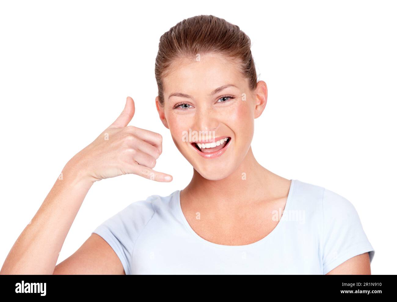 Portrait, woman and call me with smile, white background and hands for ...