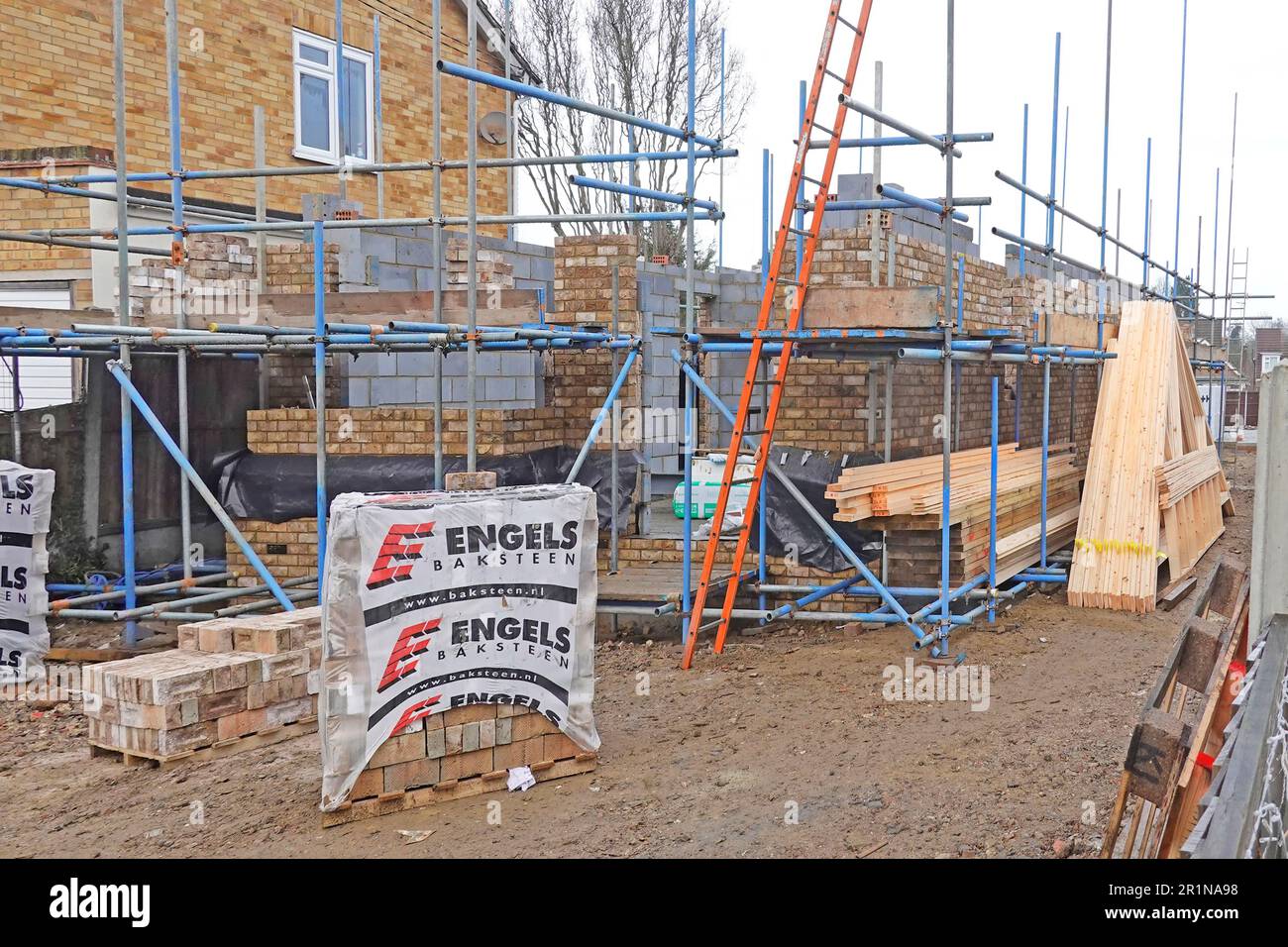 Roof trusses factory prefabricated delivered & stored on detached house ...