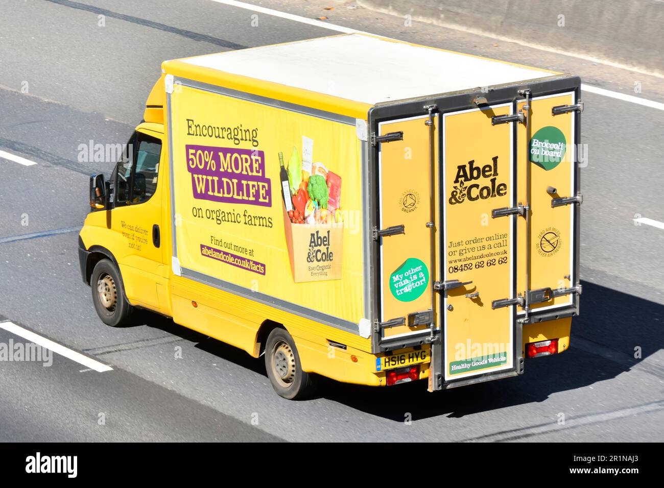 Abel & Cole delivery van driving on M25 motorway retail business ...