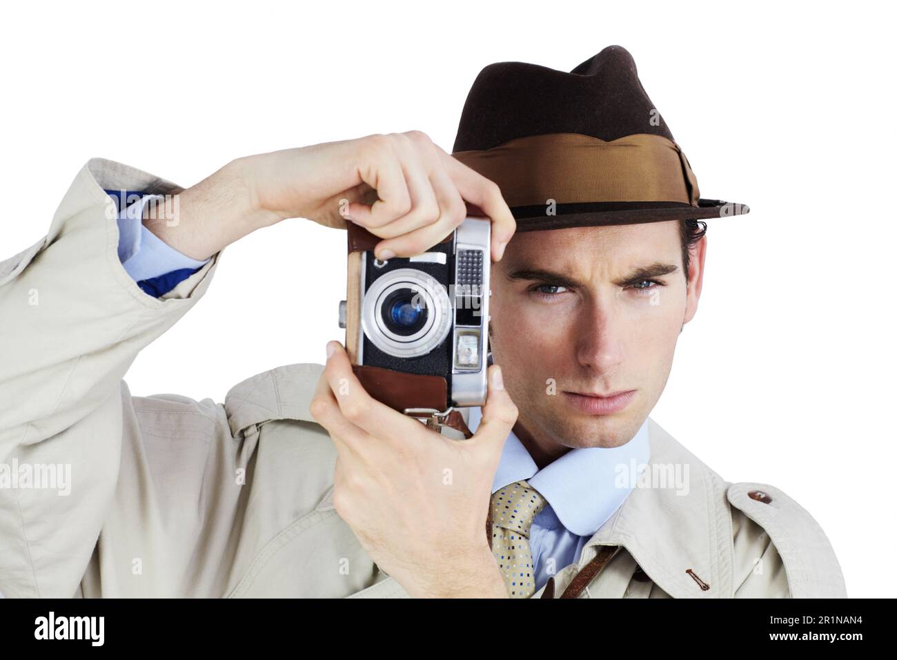 Detective, camera and spy with portrait of man in studio for ...
