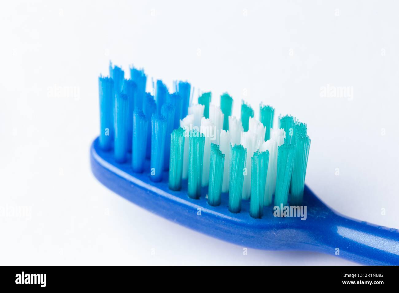 Close up of a Plastic toothbrush head On A white Background Stock Photo ...