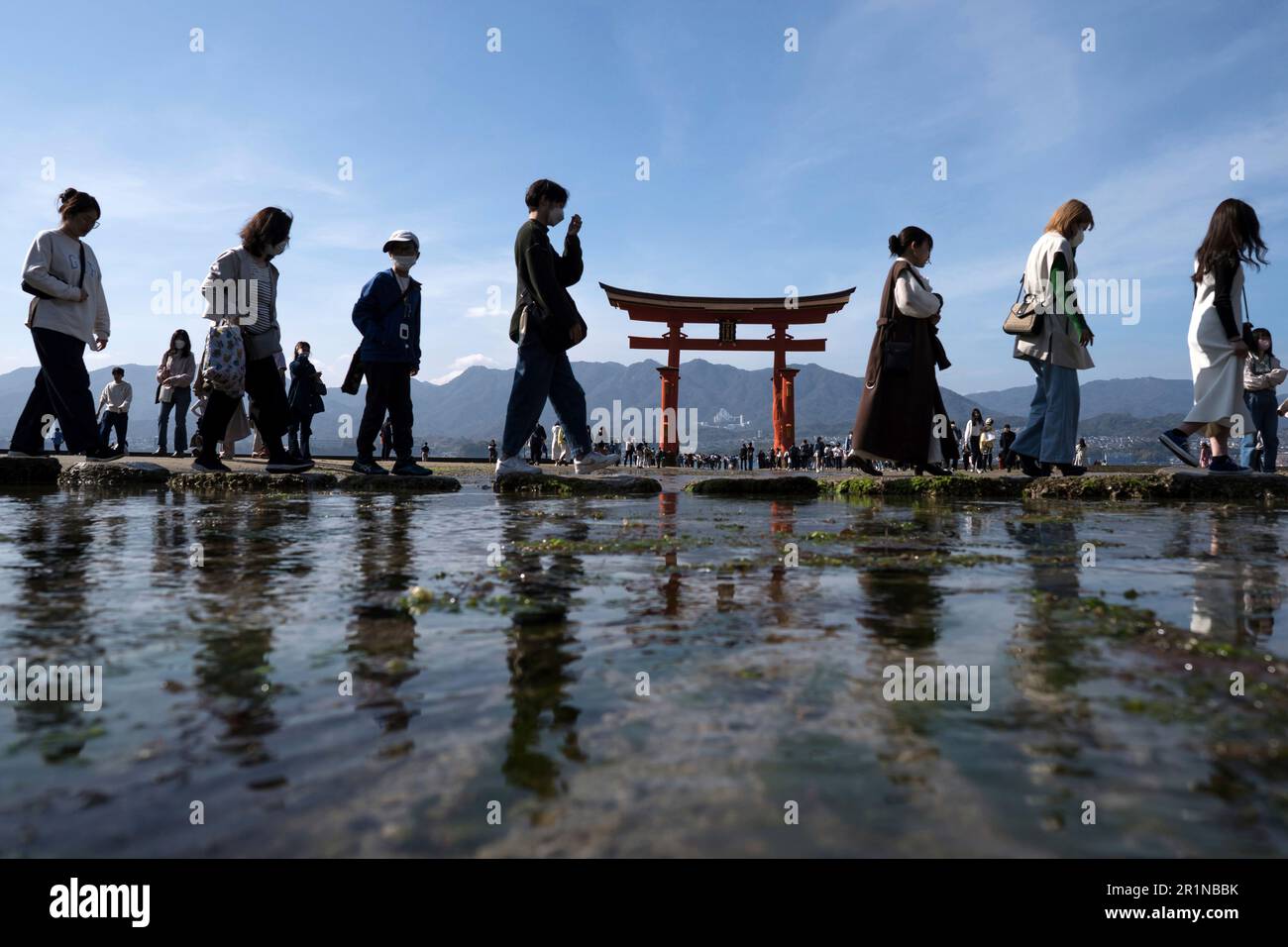 IMAGE DISTRIBUTED FOR HIROSHIMA TOURISM ASSOCIATION - Visitors walk ...