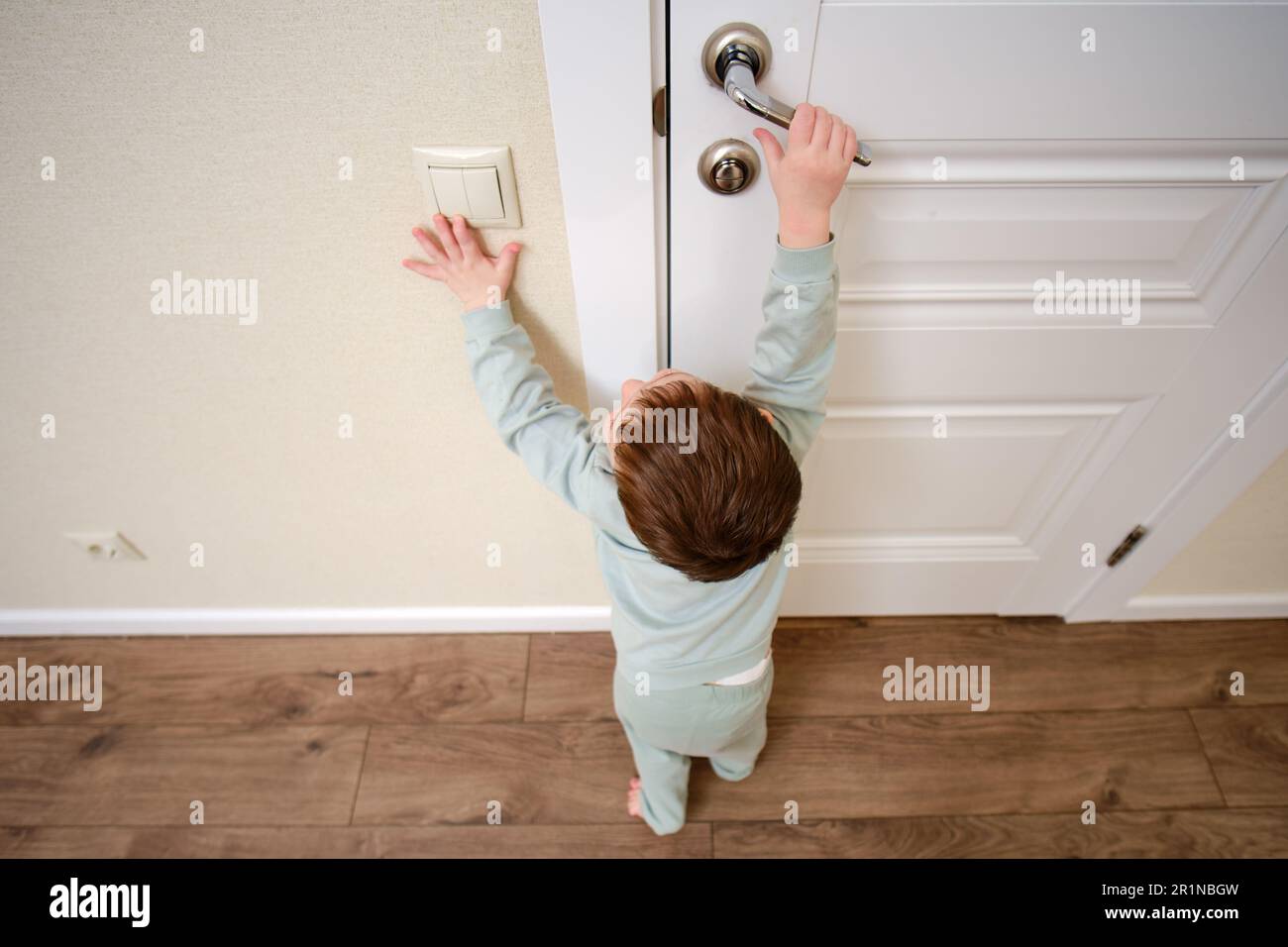 Child turns off light hi-res stock photography and images - Alamy