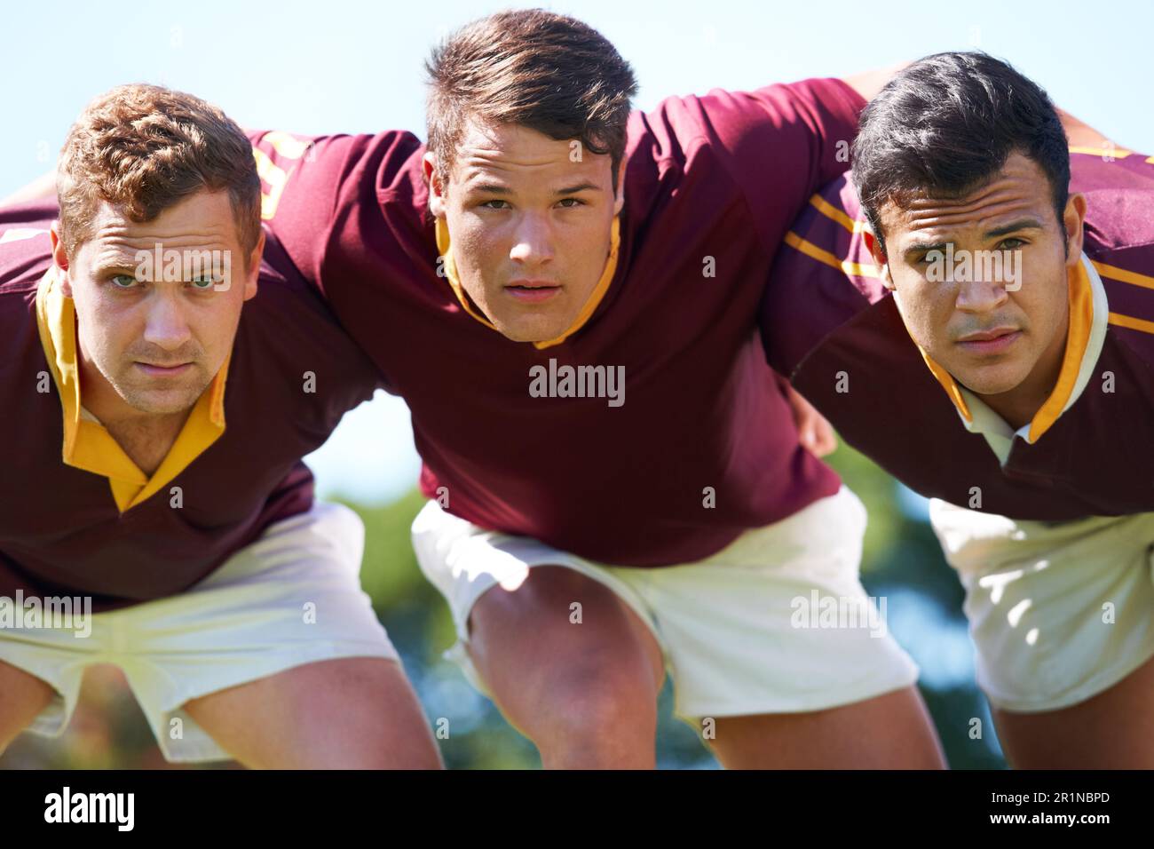 Rugby, sports and men for team portrait outdoor on pitch for scrum, hug ...