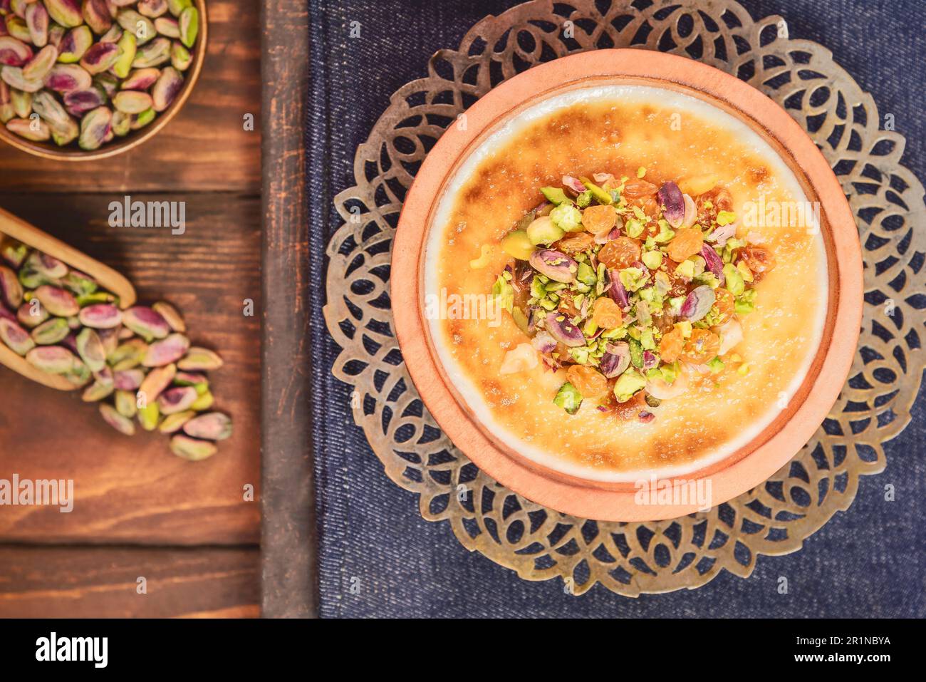 Arabic Cuisine; Traditional Egyptian dessert "Om Ali" or "Umm Ali" of ...