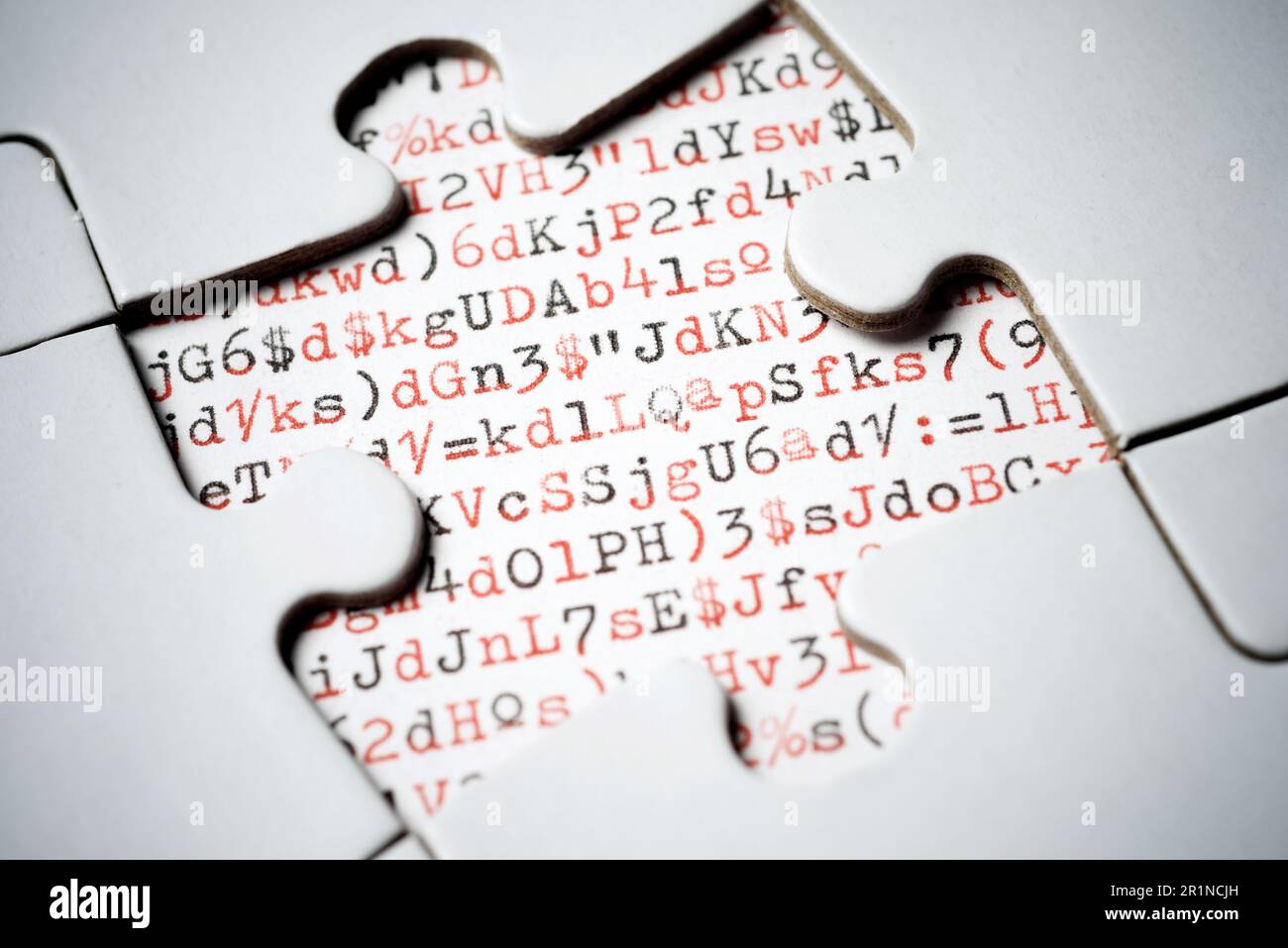 Letters, numbers and signs written with a typewriter in a white puzzle ...