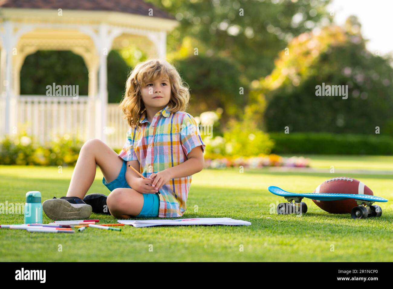Child play and draw craft artwork homework. School kid drawing in ...